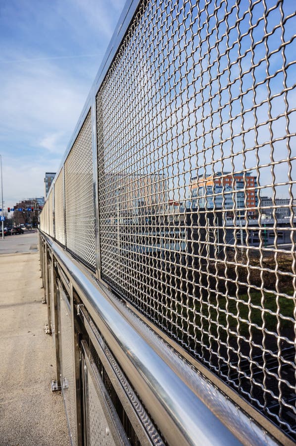 Metal Grid Fence Over the Window of a Modern Building Stock Photo ...