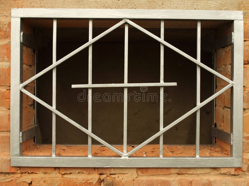 Metal grid in the window stock image. Image of close - 21747579