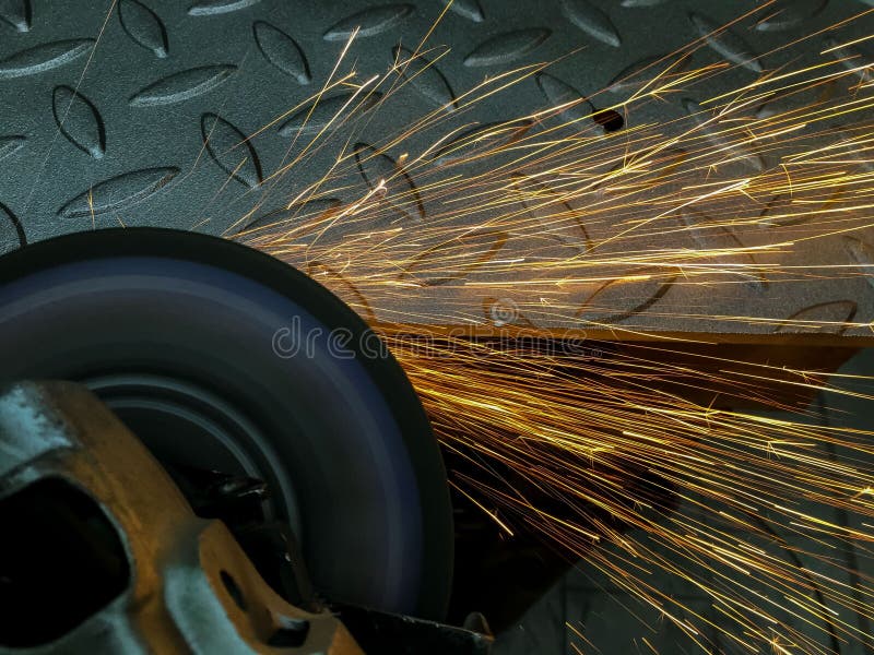 Grinding of Sharp Edges of Metal. Sparks Stock Photo - Image of safety ...