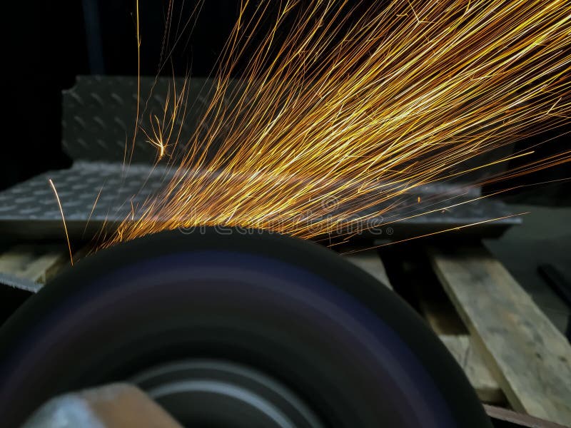 Grinding of Sharp Edges of Metal. Sparks Stock Photo - Image of flame ...