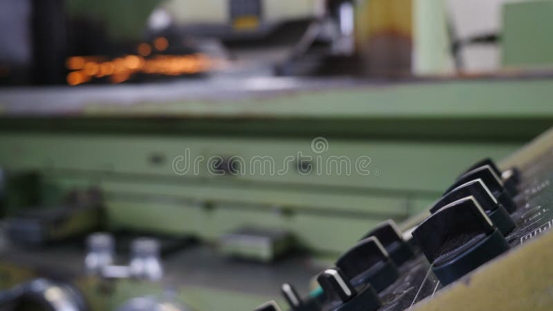 Metal Grinding Lathe in Background in Working Process. Shot through ...