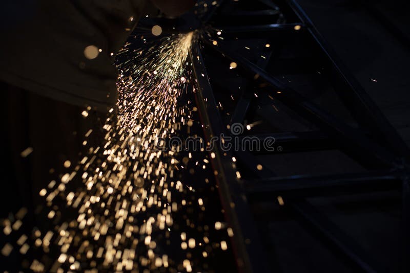 Metal Grinding. Sparks from Friction. Lights in Dark Stock Image ...