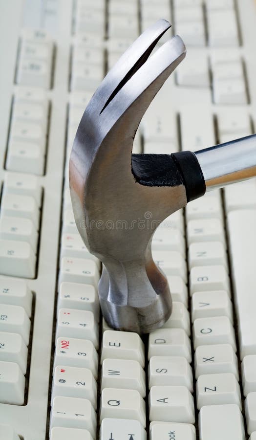 Metal hammer on keyboard stock photo. Image of action - 7995034