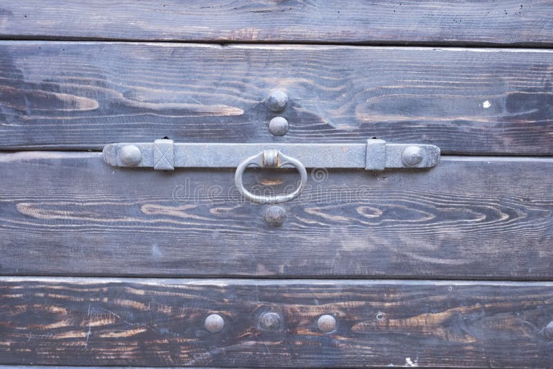 Metallic handle stock image. Image of detail, wood, doors - 116179225