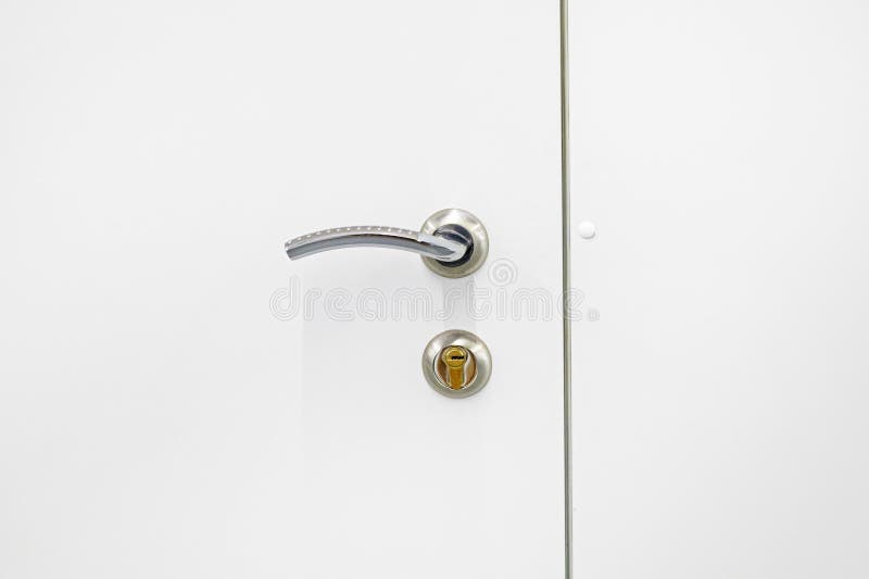 Metal Handle on a White Closed Door. Modern Interior. Stock Photo ...