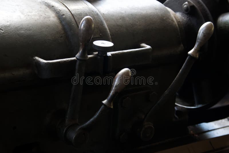 Metal handles on old lathe stock image. Image of knob - 61772067