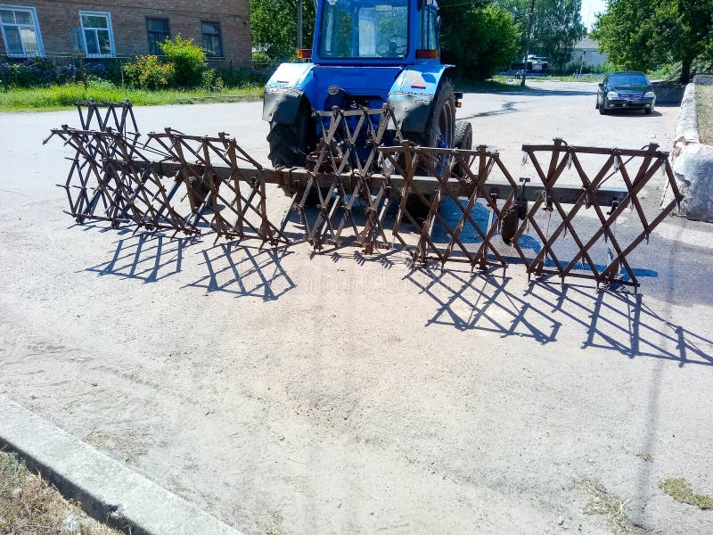Metal Harrow Hitch Attached To the Tractor Stock Photo - Image of ...