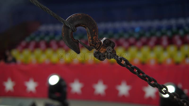 A Metal Hook with a Large Chain for Securing Safety Ropes and Circus ...