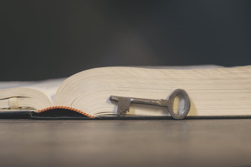 Metal Key and Book on the Table Stock Image - Image of read, concept ...
