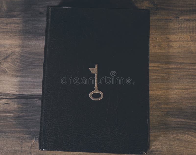 Metal Key and Book on the Table Stock Photo - Image of cover, ancient ...