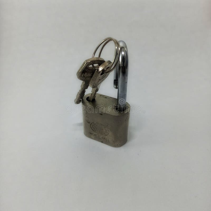 Metal Keys Rest in an Open Padlock, Symbolizing Access and Control. a ...