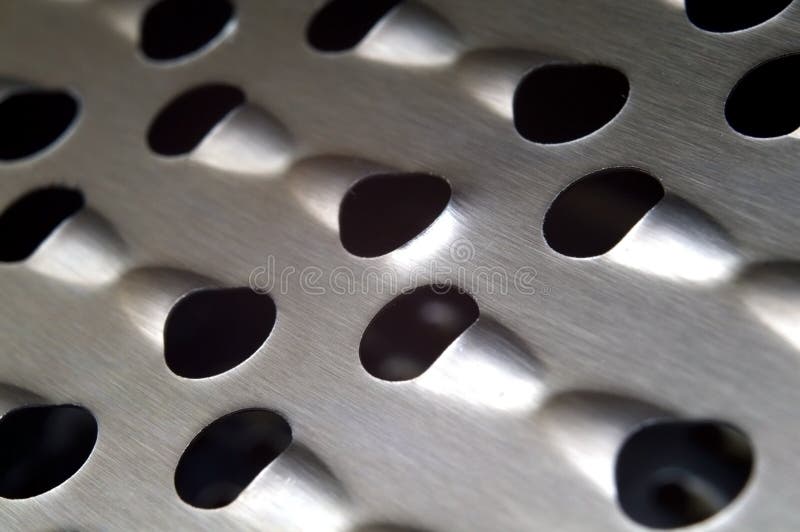 Metal Kitchen Grater with Large Holes. Macro Stock Photo - Image of ...