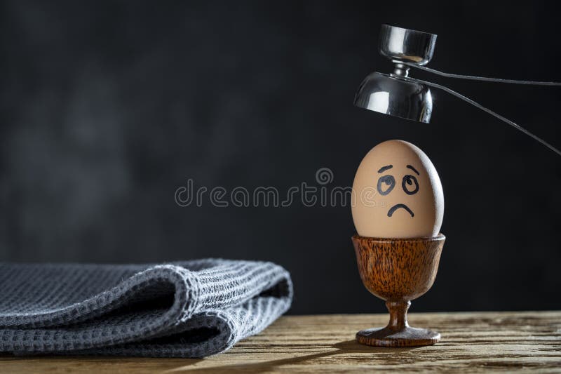 Metal Knocker Opener Egg before Breaking the Boiled Egg with Sad Face ...