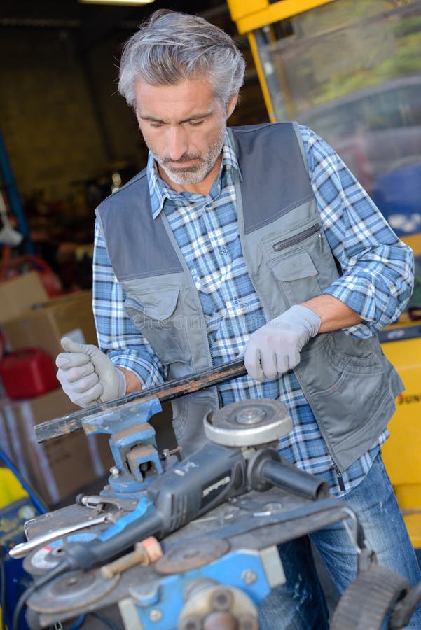 Metal laborer at work stock image. Image of complex - 119531543