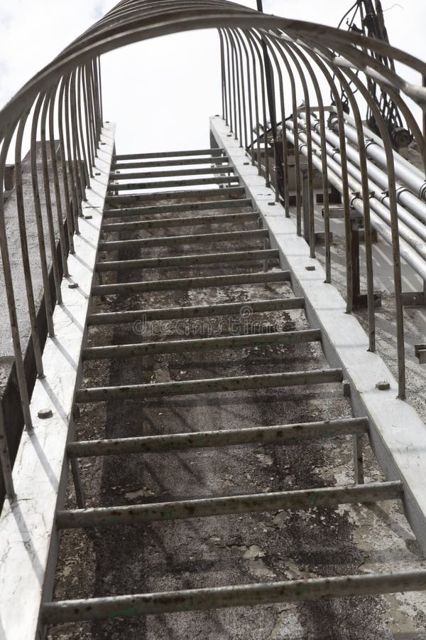 Metal Ladder on an Industrial Building Stock Image - Image of building ...