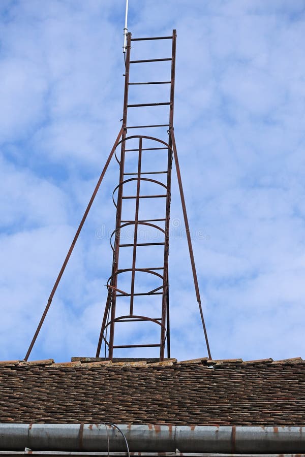Metal Ladder on the Roof of a Building Stock Photo - Image of blue ...