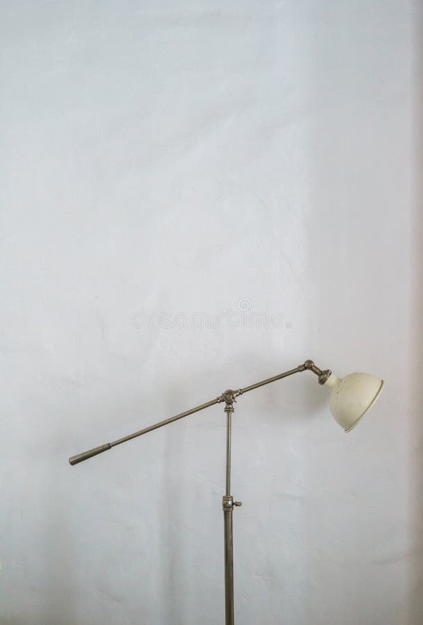 Metal Lamp Stand on White Wall Stock Photo - Image of long, shade ...