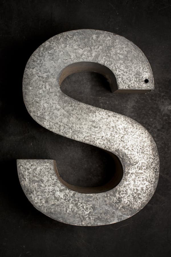 Alphabet`s Letters Made Out of Ice Isolated on Dark Studio Background ...