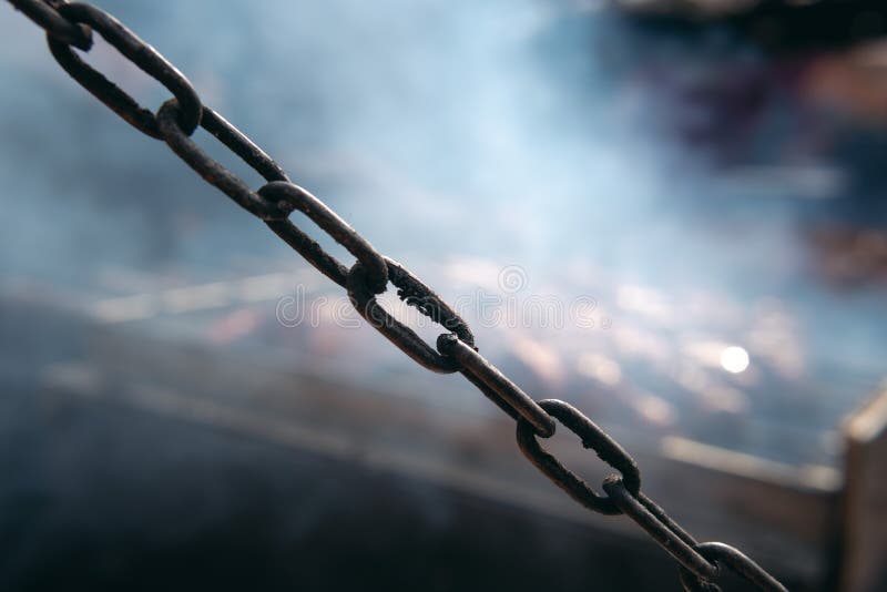 Metal Linked Chain on Dark Background. Smoke from a Fire, Barbecue with ...
