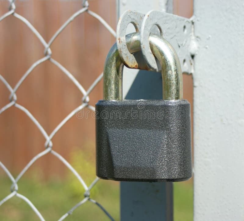 Metal Lock closeup stock photo. Image of fence, padlock - 27907616