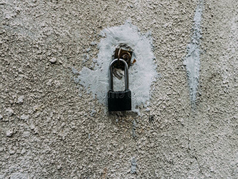 Metal lock on the wall stock image. Image of doorway - 103587691