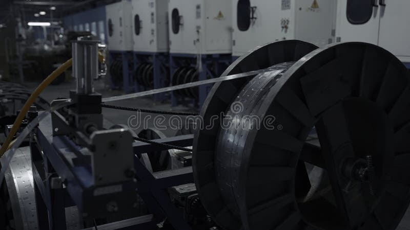 Metal Long Narrow Sheets Wraping on a Bobbin. Creative. Large Spool in ...