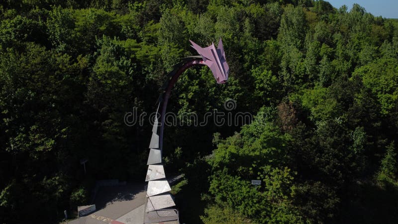 Metal-made Purple Dragon Head before the Green Trees Editorial Stock ...