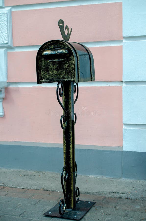 A Metal Mailbox in Retro Style on a Long Leg. Editorial Photography ...