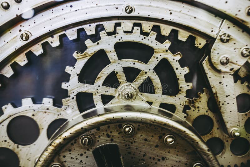 Metal mechanism of a clock stock image. Image of clock - 195156527