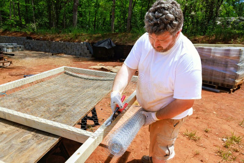 Metal Mesh is Cut Using Scissors for Metal by a Worker Stock Photo ...