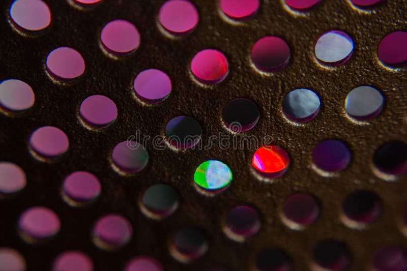 Metal Mesh with Round Holes through Which Light Beams of Different ...