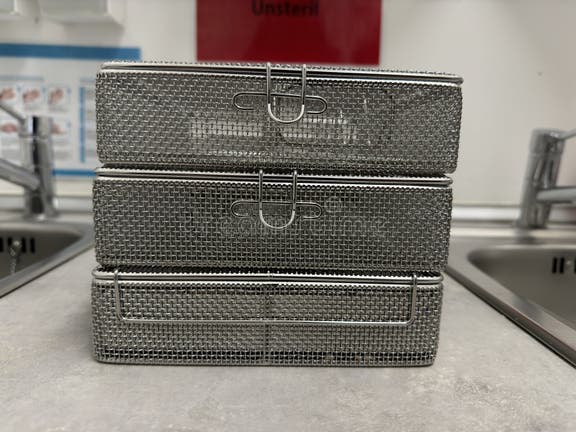 Metal Mesh Sterilization Trays in Medical Setting Stock Photo - Image ...