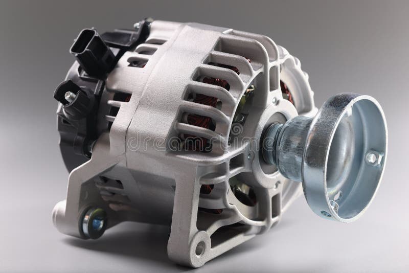 Metal Motor with Wire and Plugs Lies on Grey Surface, Production of ...