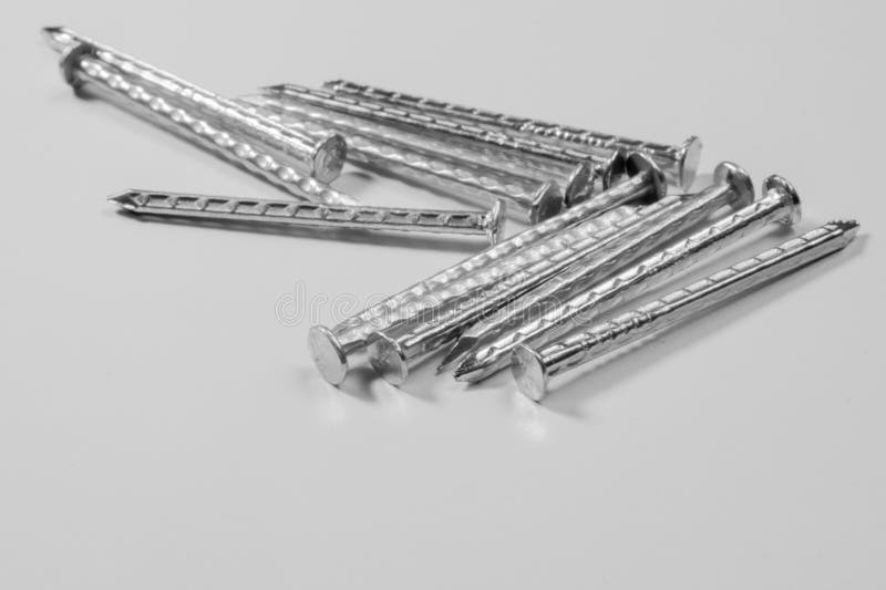 Metal Nails Isolated on White Background. Working Tools Stock Photo ...
