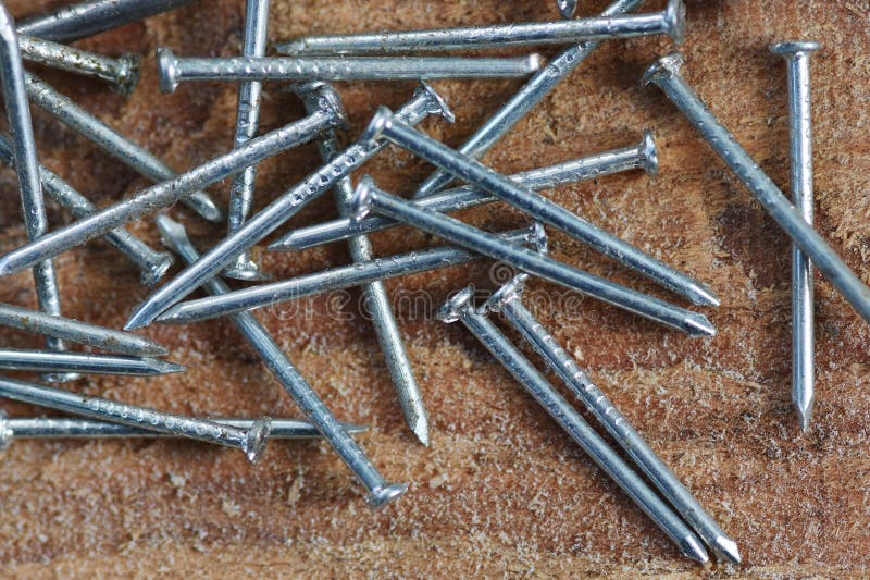 Metal Nails on Wood Background. Abstract Background and Texture Stock ...
