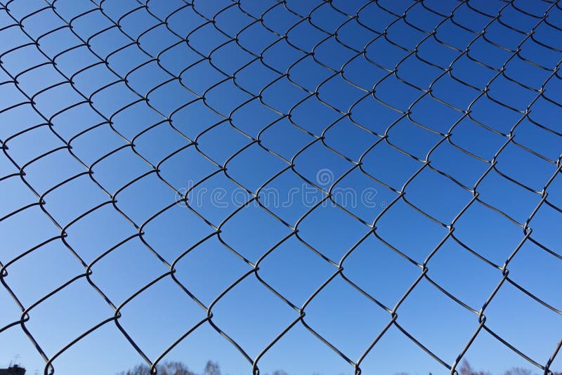 Metal Net with Blue Sky, Iron Fence on a Blue Sky, Mesh Fence, Chain ...