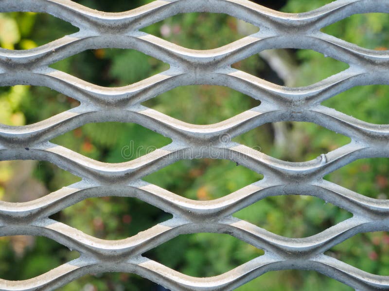 Metal Net with Green Blured Background. Stock Image - Image of floor ...