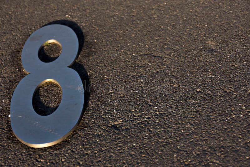 Metal Numbers in the Ground Stock Photo - Image of number, three: 165072036