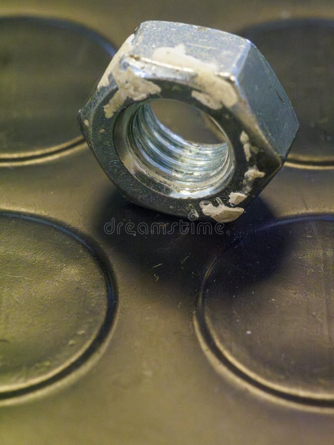 Metal Nut Sitting on Textured Surface Stock Image - Image of ...