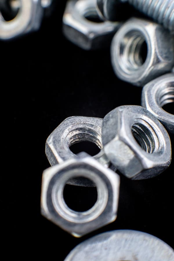 Metal Nuts and Bolts Background. Macro. Working Tools. Fixing Elements ...