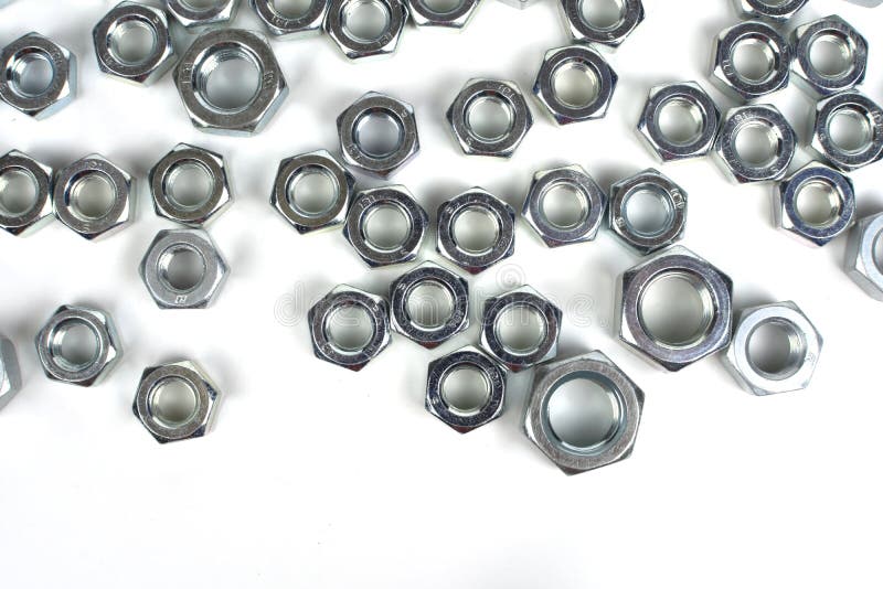 Metal Nuts of Different Sizes on a White Background Stock Image - Image ...