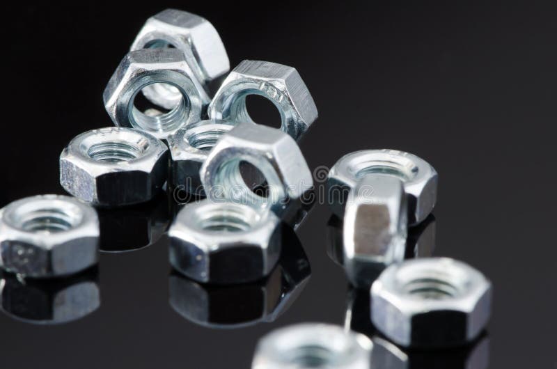 Metal nuts stock photo. Image of material, group, abstract - 41101712