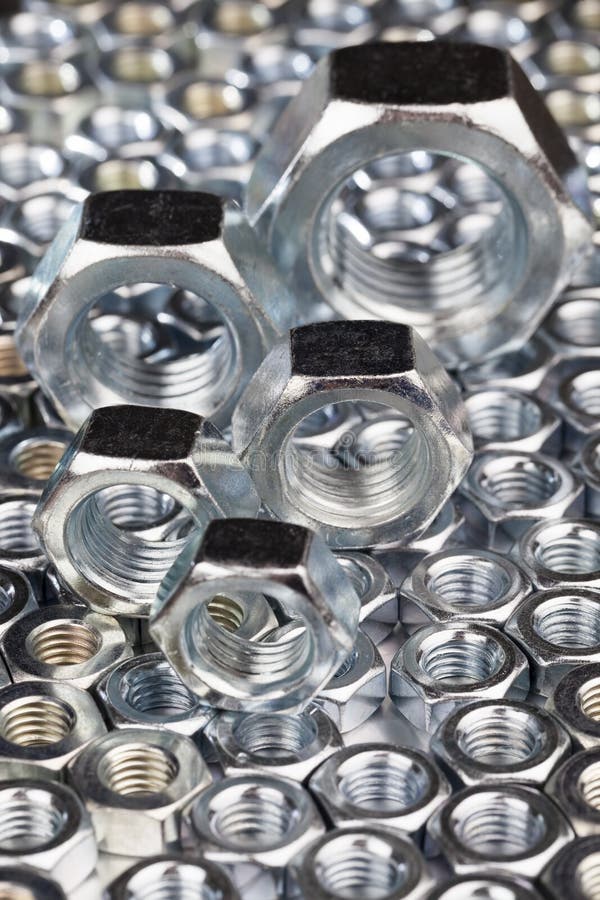 Metal Nuts for Use in Installation Stock Photo - Image of steel ...