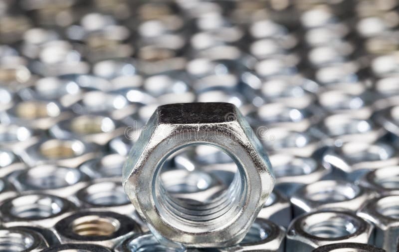 Metal Nuts for Use in Installation Stock Photo - Image of group, steel ...