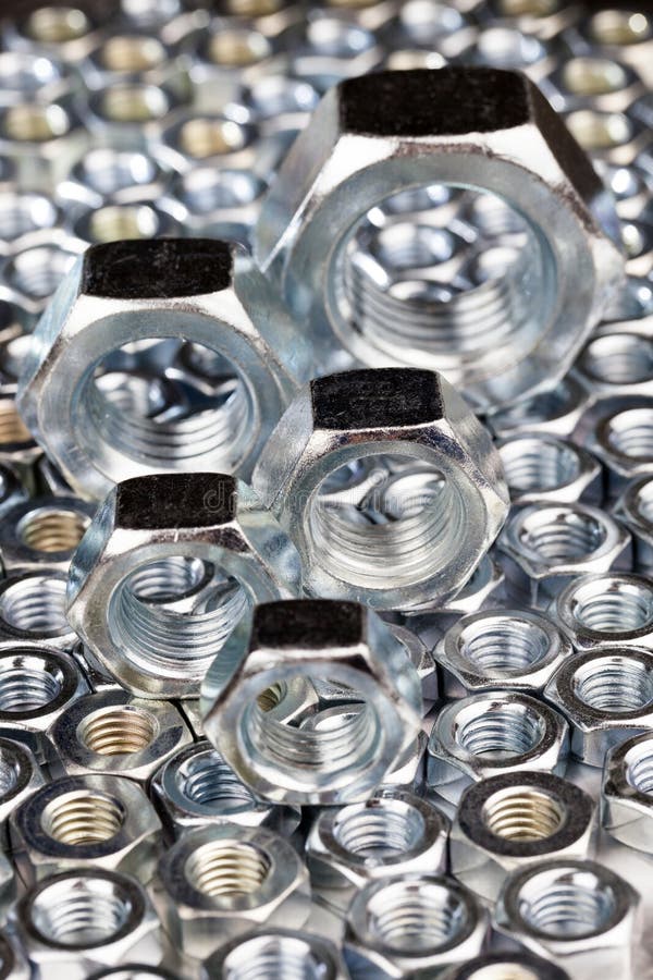 Metal Nuts for Use in Installation Stock Photo - Image of metal ...