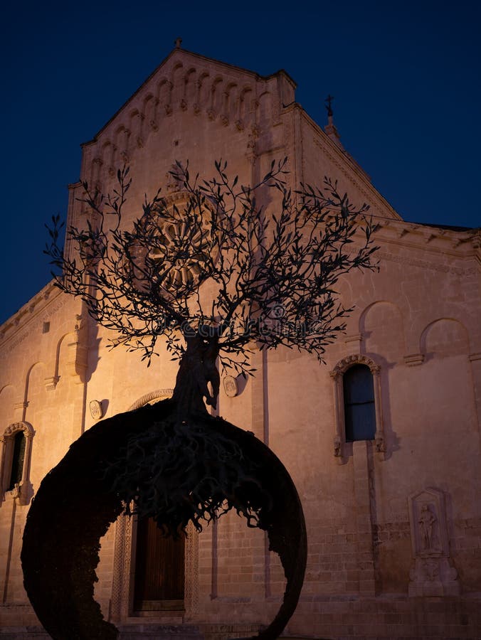 Olive Tree Sculpture Standing in Front of Matera Cathedral at Dusk ...