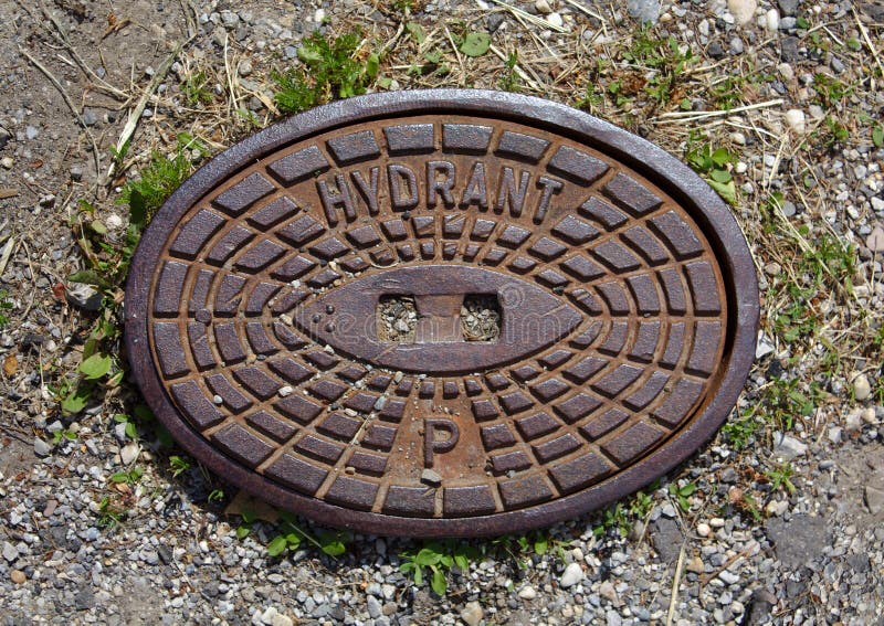 Hydrant cover. stock photo. Image of iron, oval, steel - 220473776