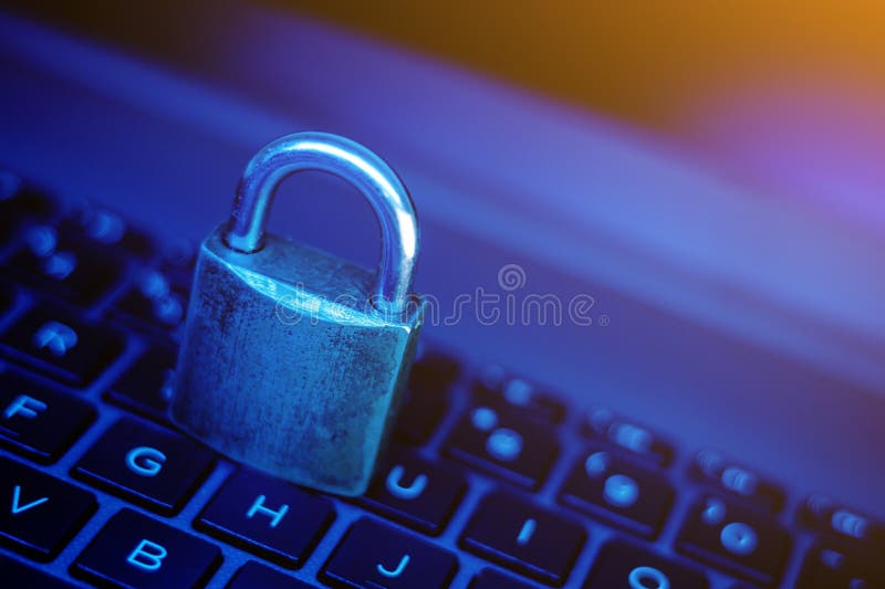 Metal Padlock on Laptop Keyboard with Blue Light Stock Photo - Image of ...