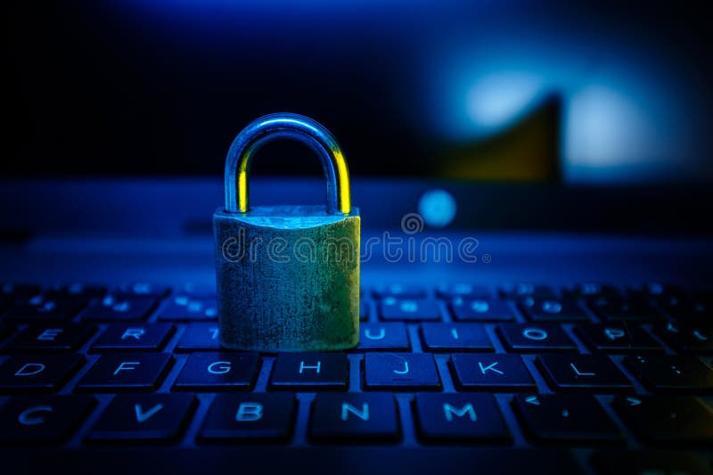 Metal Padlock on Laptop Keyboard in Dark Blue Light Stock Image - Image ...