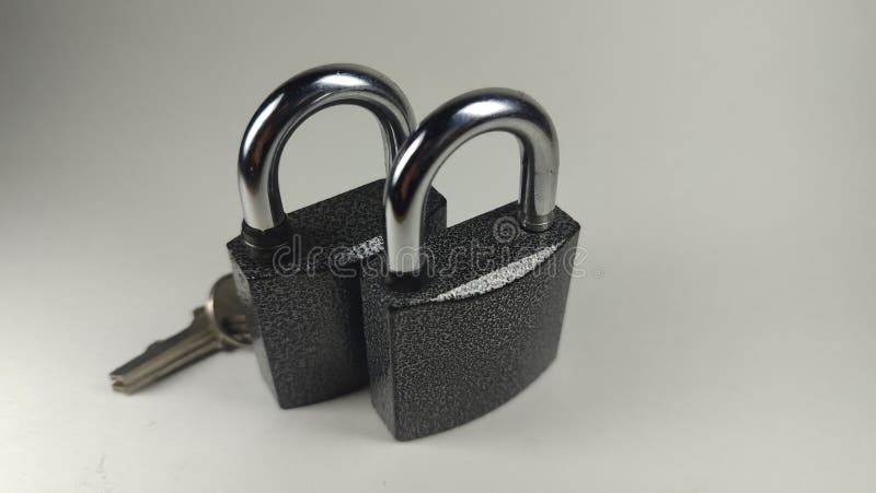 Metal Padlock. Lock it with a Key Stock Photo - Image of hack, glasses ...